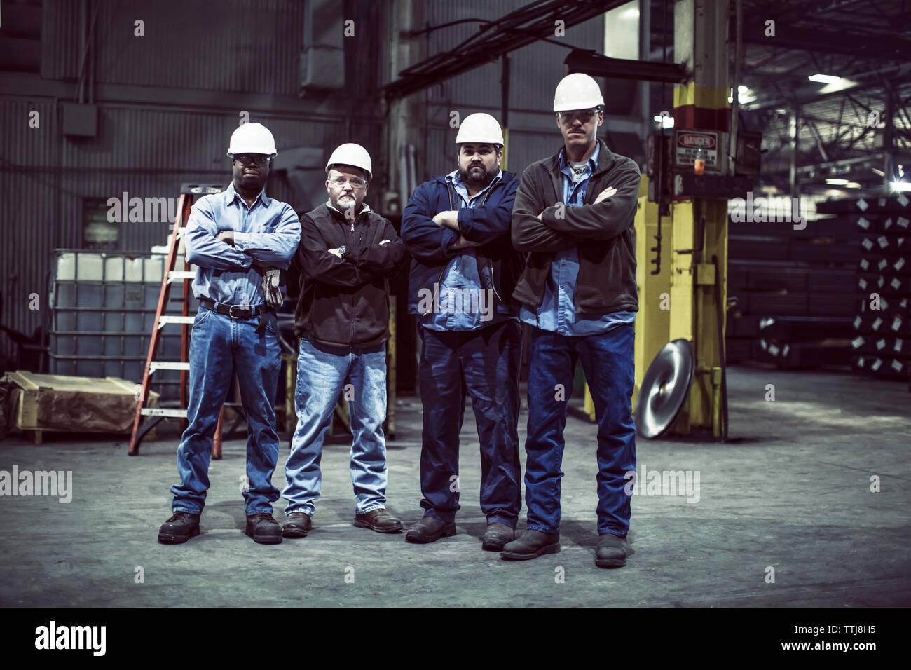 Uniforms workers hi-res stock photography and images - Alamy