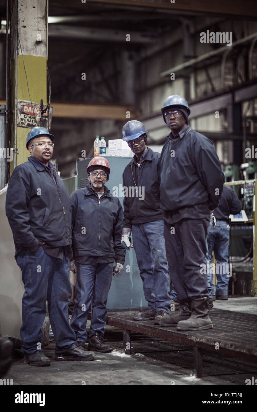 Portrait of metal workers in factory Stock Photo - Alamy