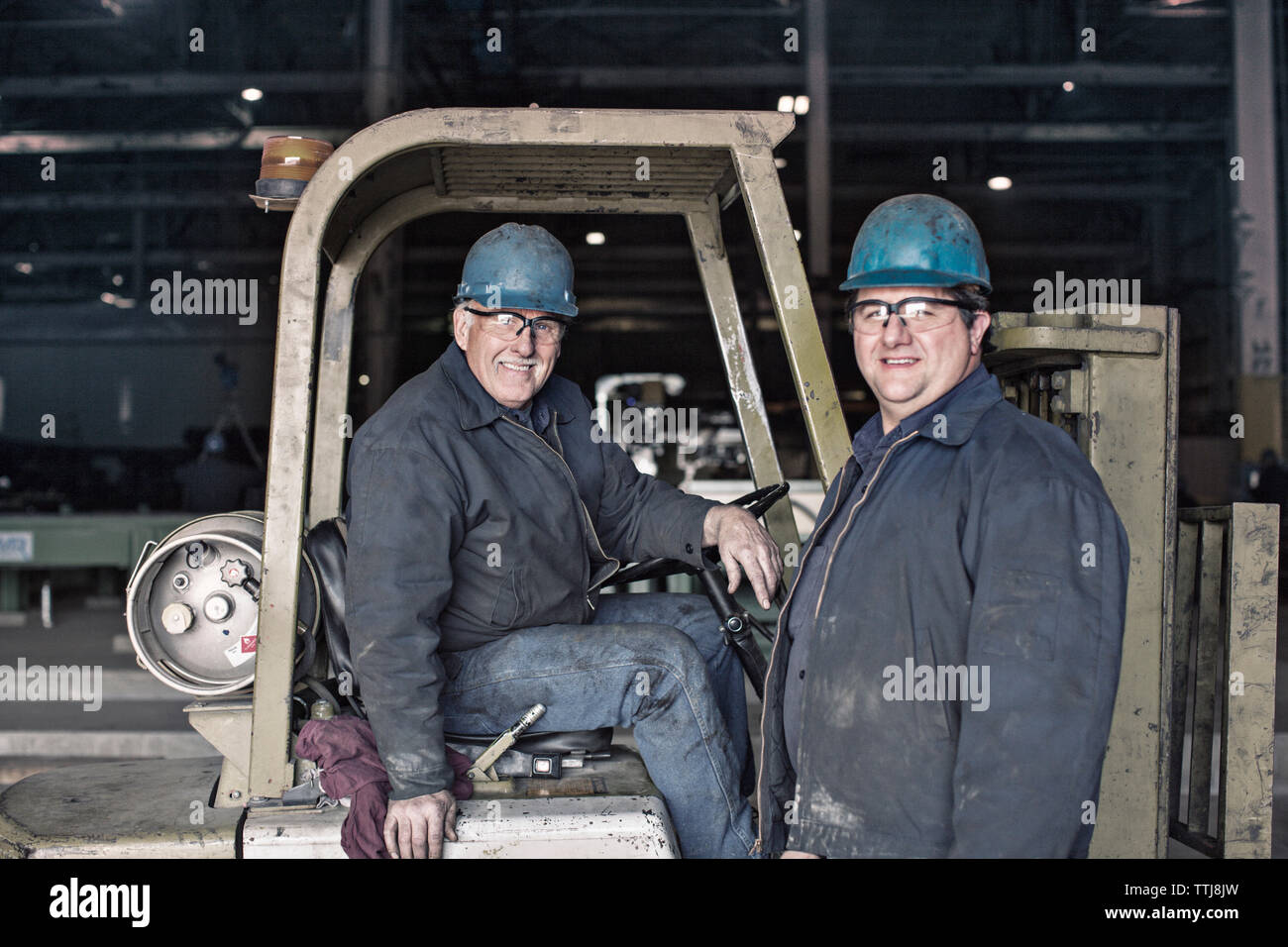 Happy industry hi-res stock photography and images - Alamy