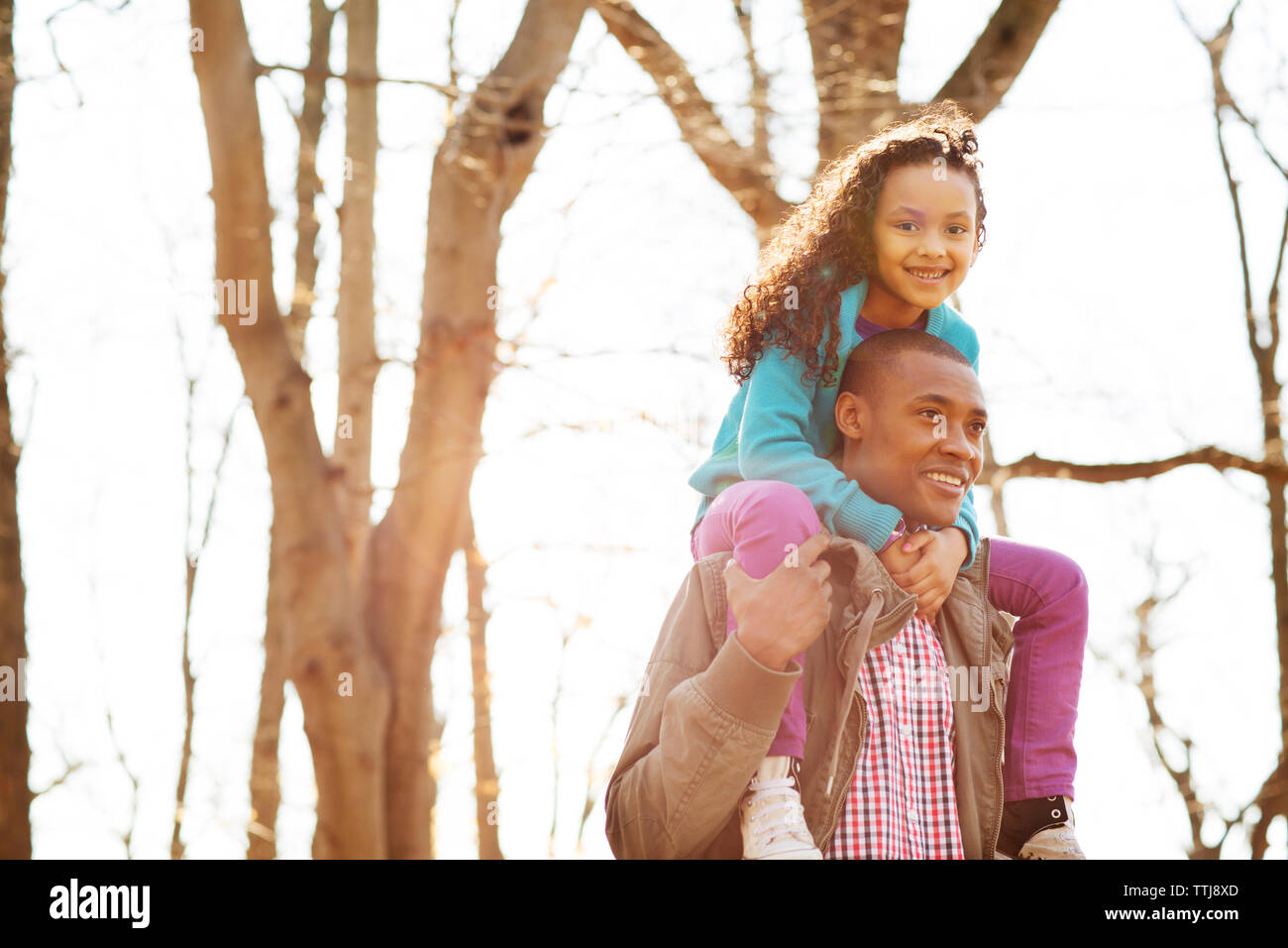 Man carrying girl on shoulders hi-res stock photography and images - Alamy