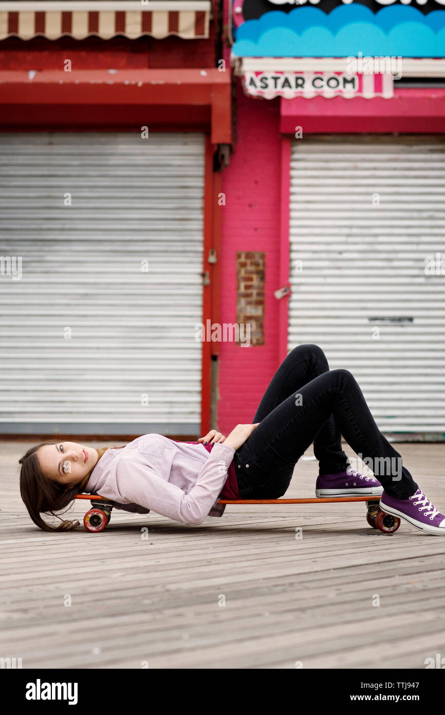 Lying on skateboard hi-res stock photography and images - Alamy