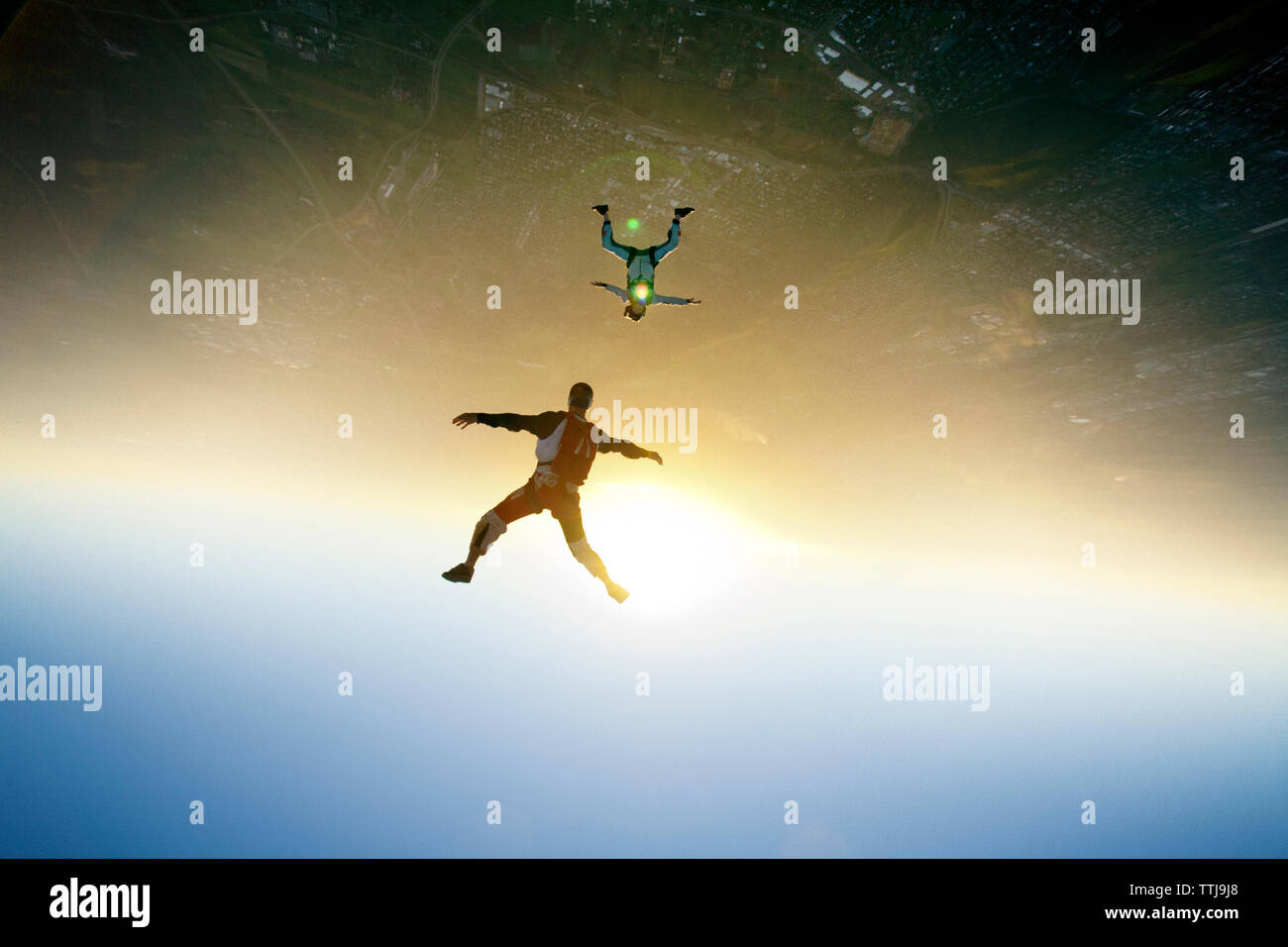 Aerial view of skydivers flying in air Stock Photo - Alamy