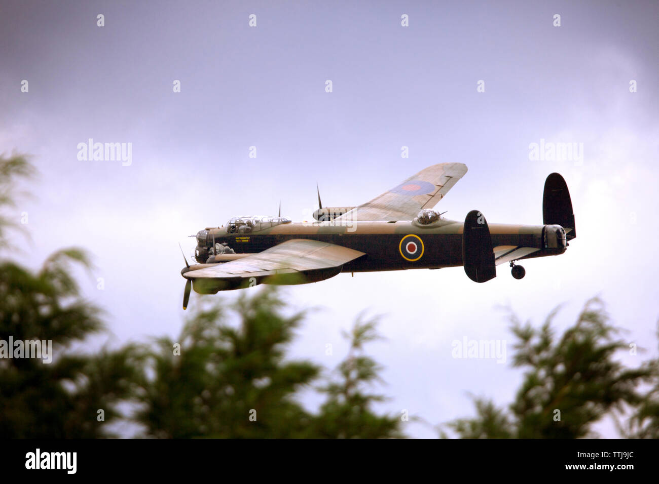 Fighter plane flying in air Stock Photo - Alamy