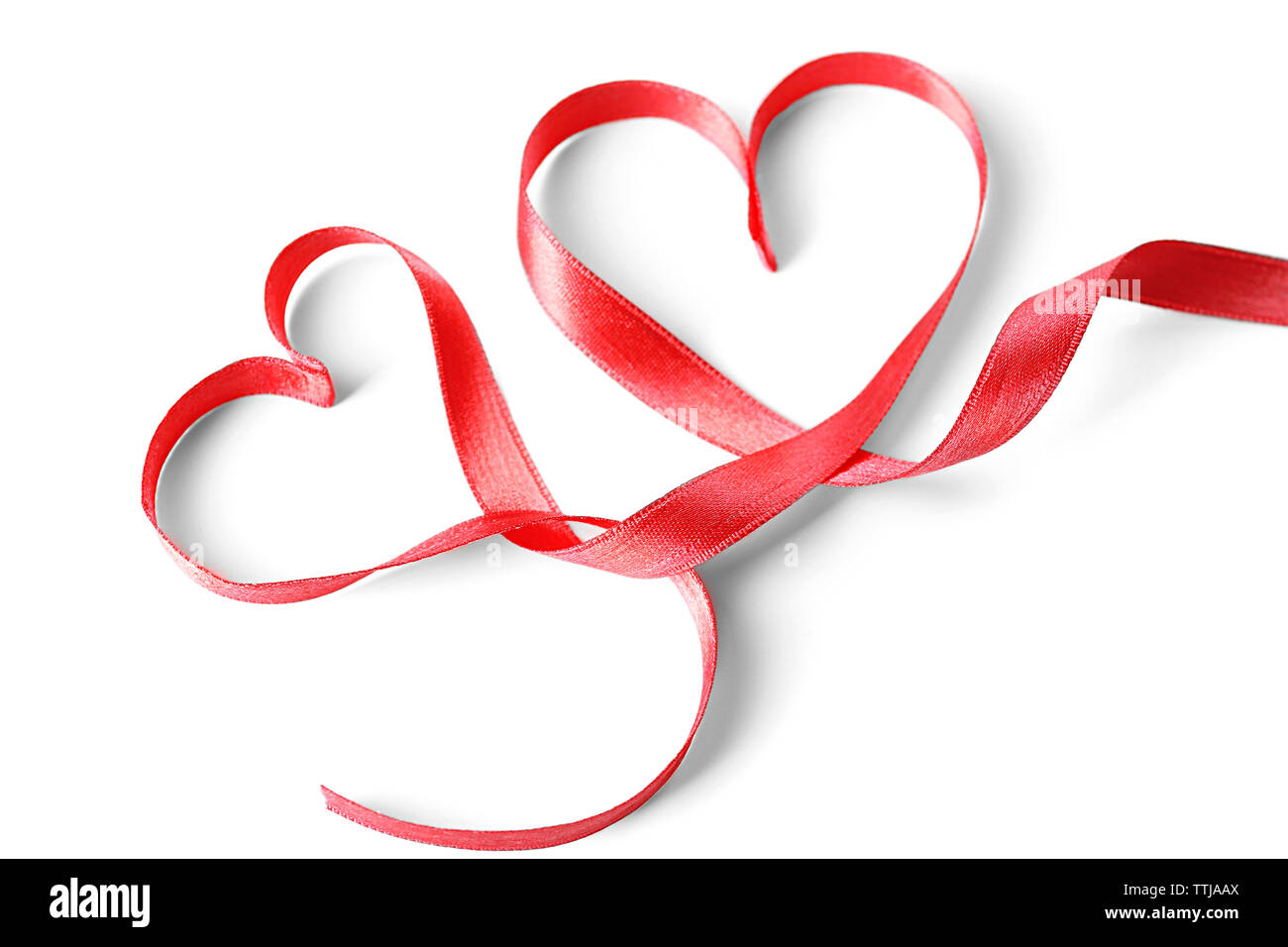Red heart shaped ribbon isolated on white Stock Photo - Alamy