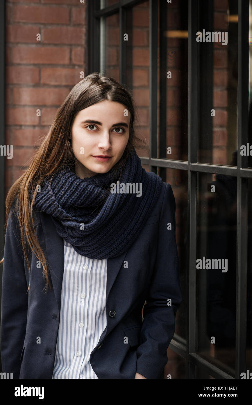 Standing by windows hi-res stock photography and images - Alamy