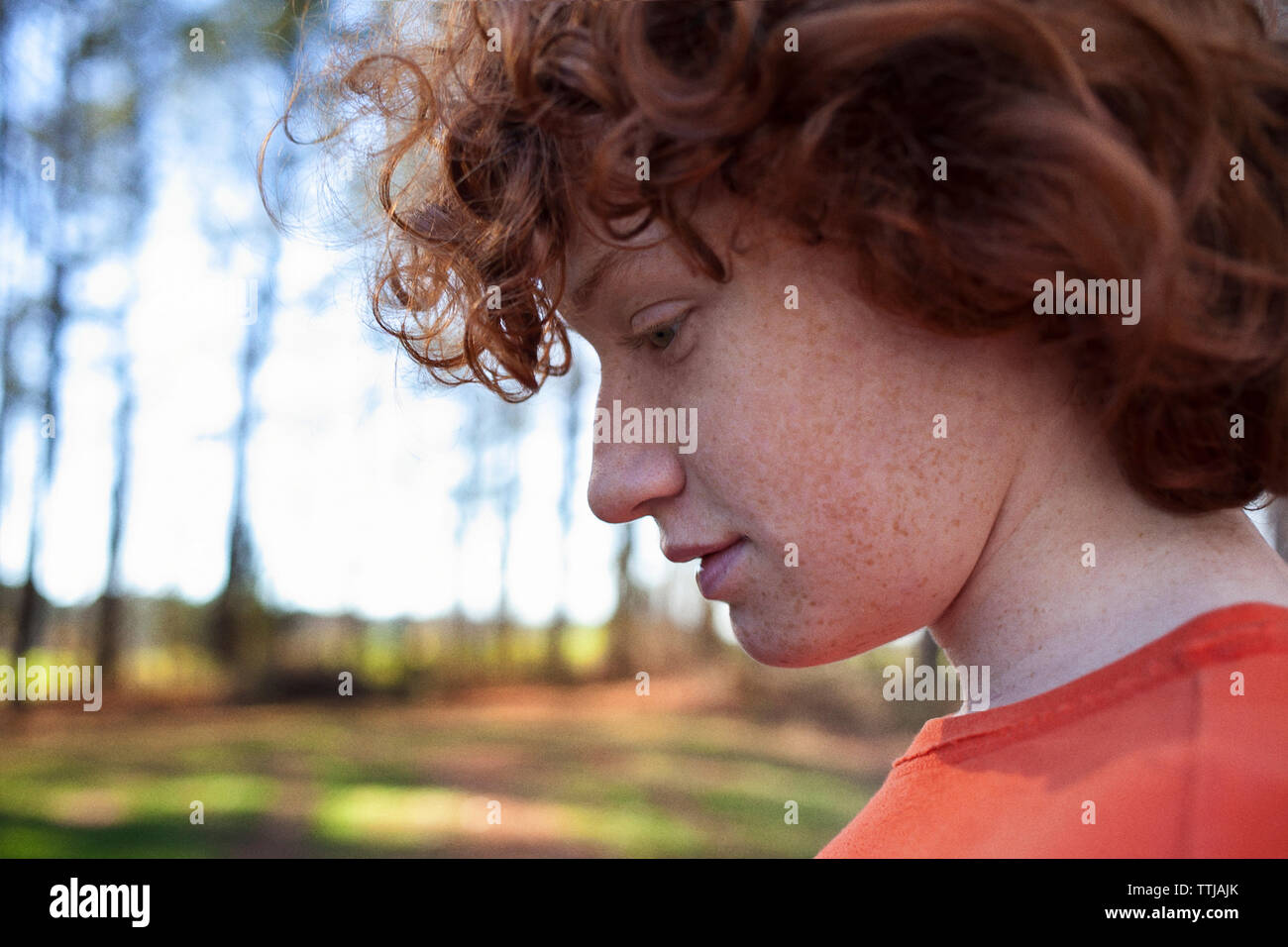 Close-up of boy in backyard Stock Photo - Alamy