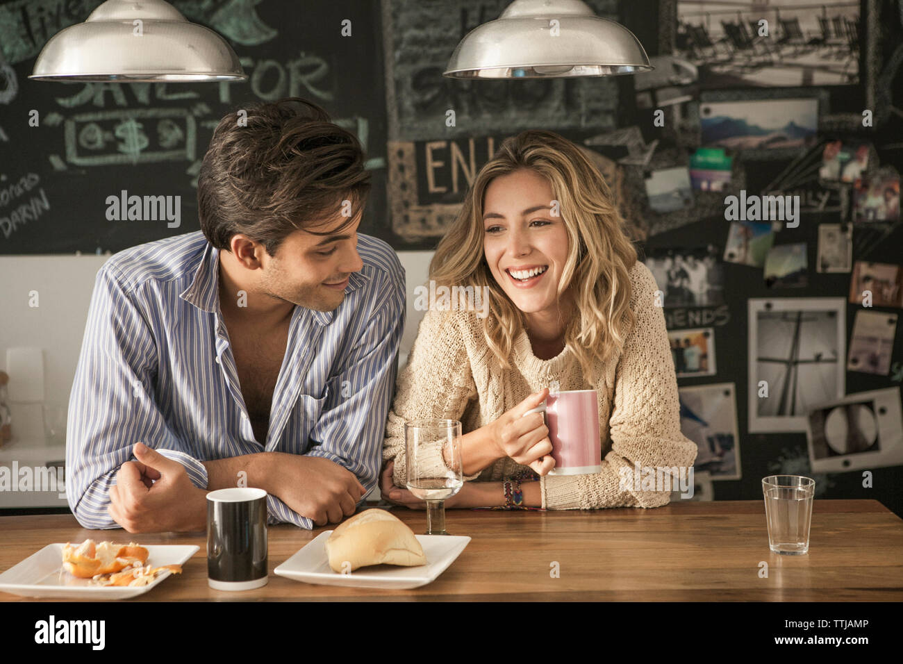 Couple at the table hi-res stock photography and images - Alamy