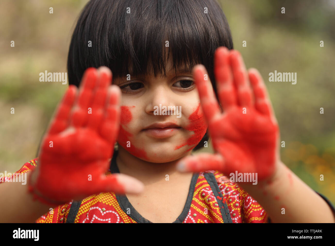 Girl celebrating holi festival Stock Photo - Alamy