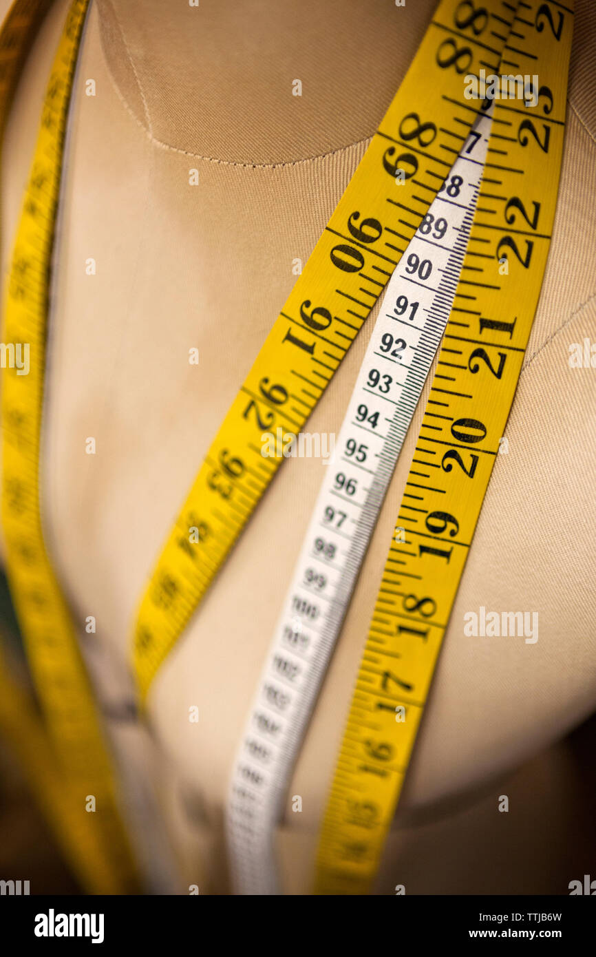 Close-up of mannequin with tape measure Stock Photo - Alamy