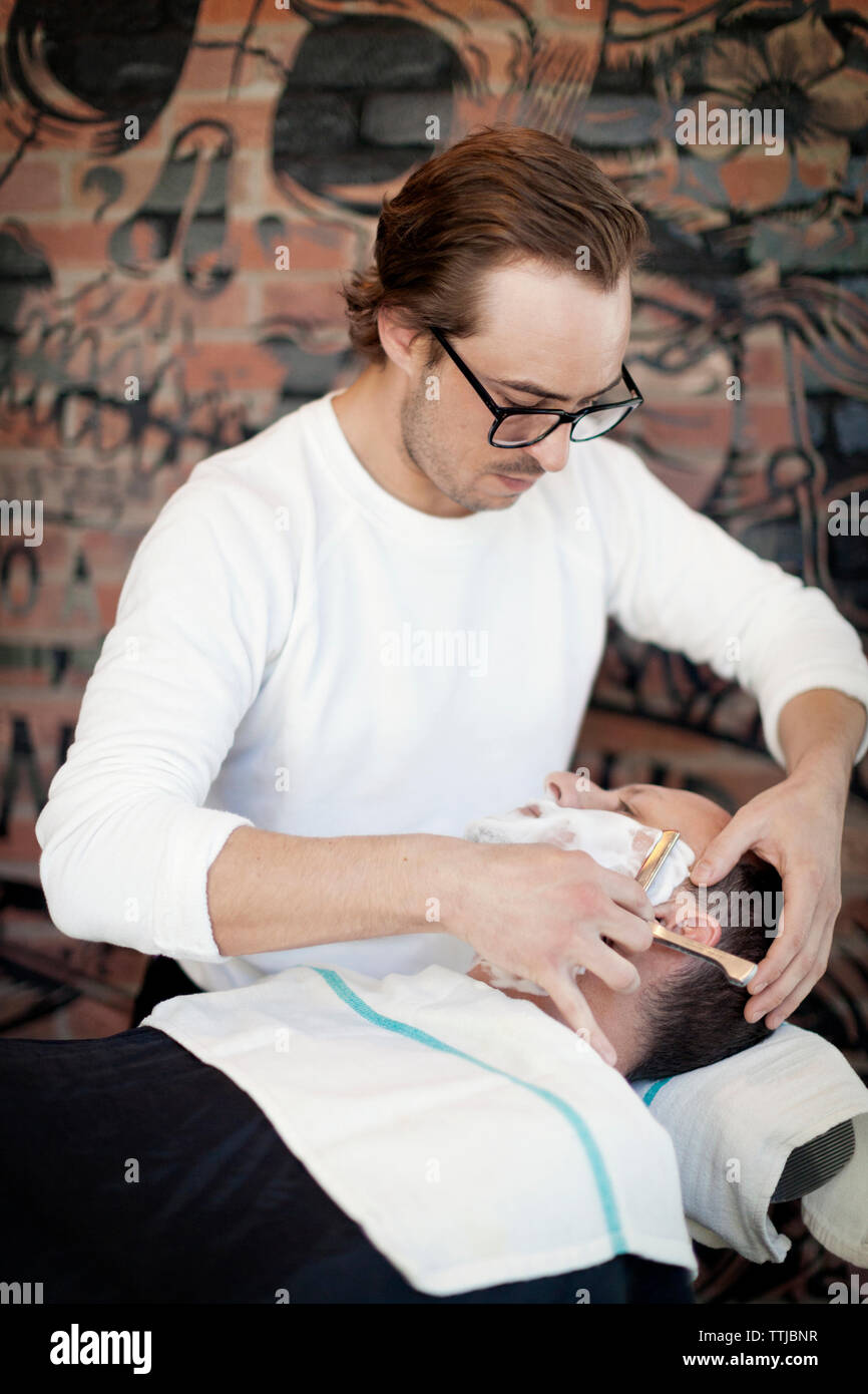 Man shaving back hi-res stock photography and images - Alamy