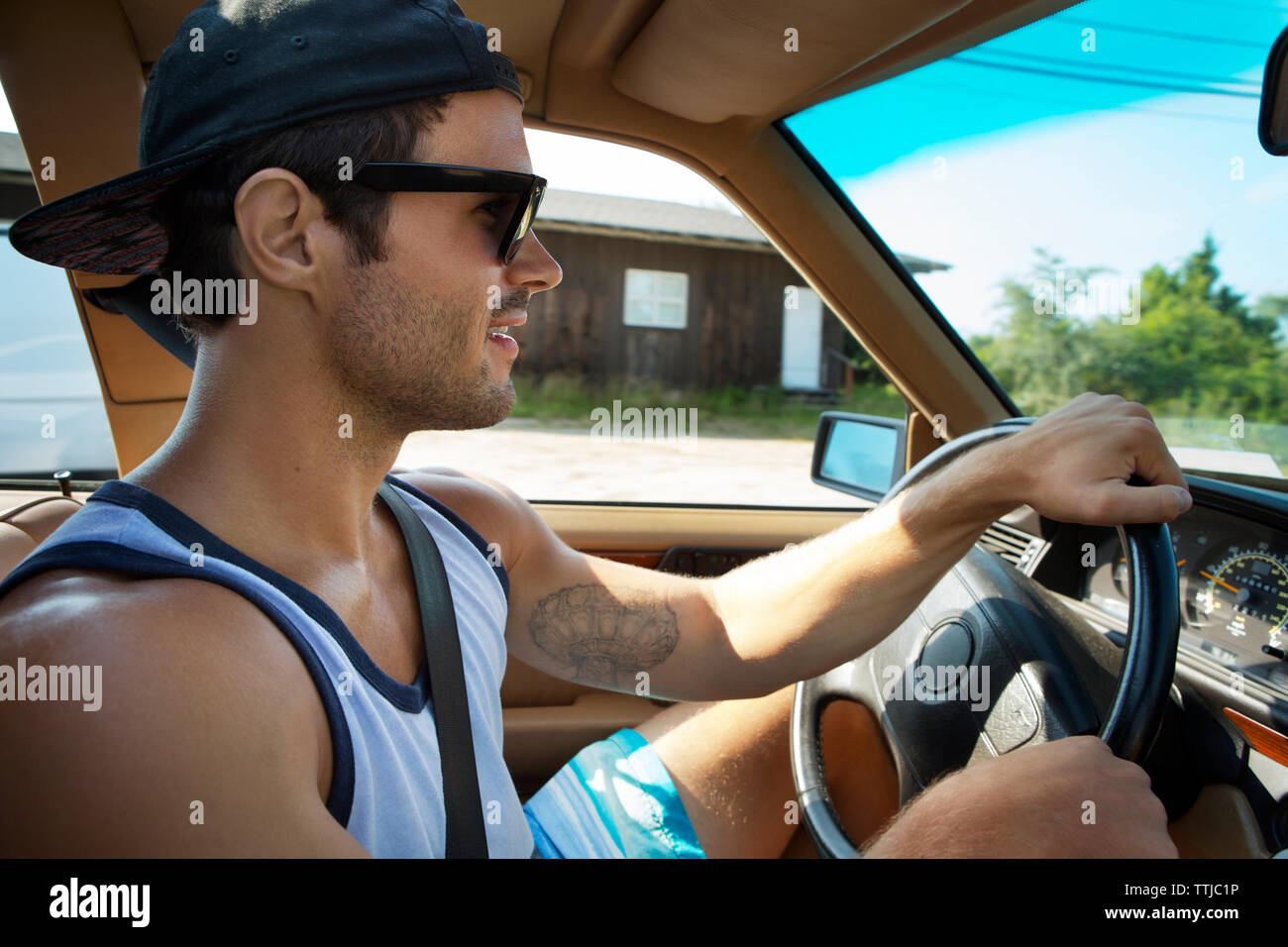 Man driving car Stock Photo - Alamy
