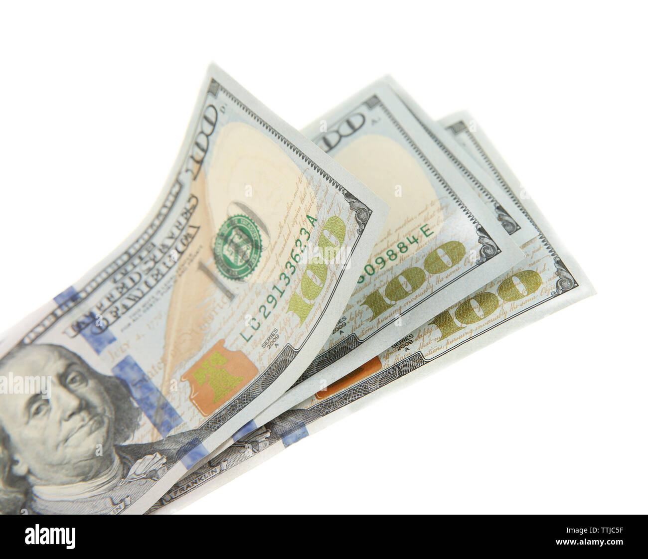 Stack of dollars banknotes, isolated on white Stock Photo - Alamy