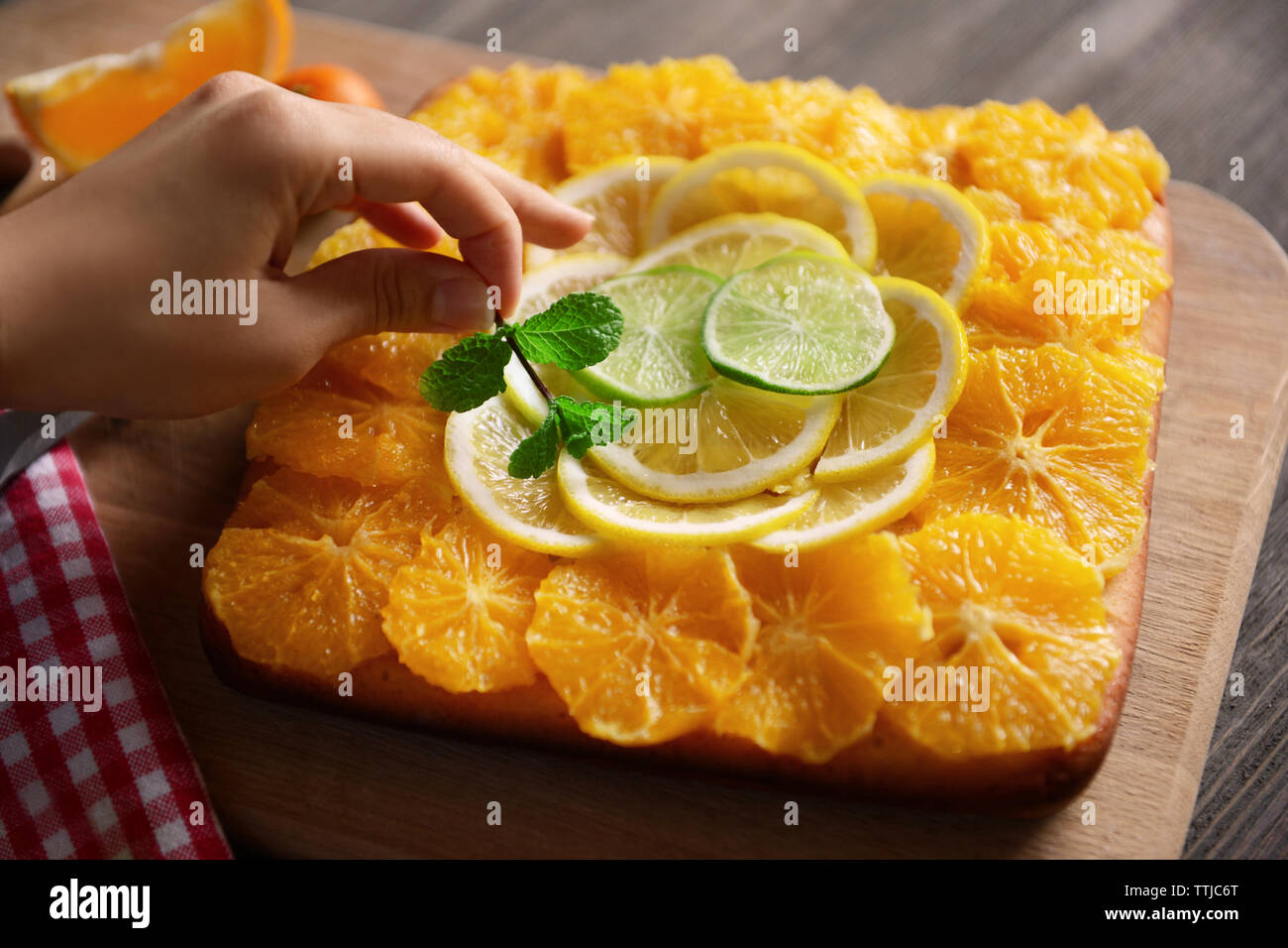 Female hand decorating citrus hi-res stock photography and images - Alamy
