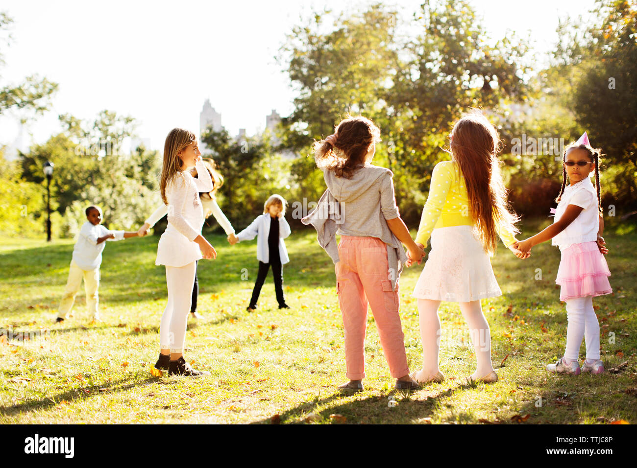 Playing standing hi-res stock photography and images - Alamy