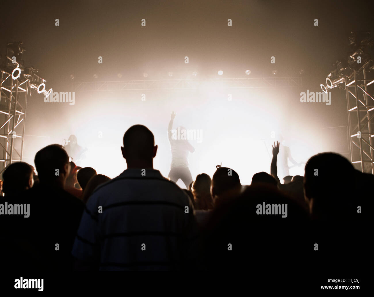 Men performing at rock concert Stock Photo - Alamy