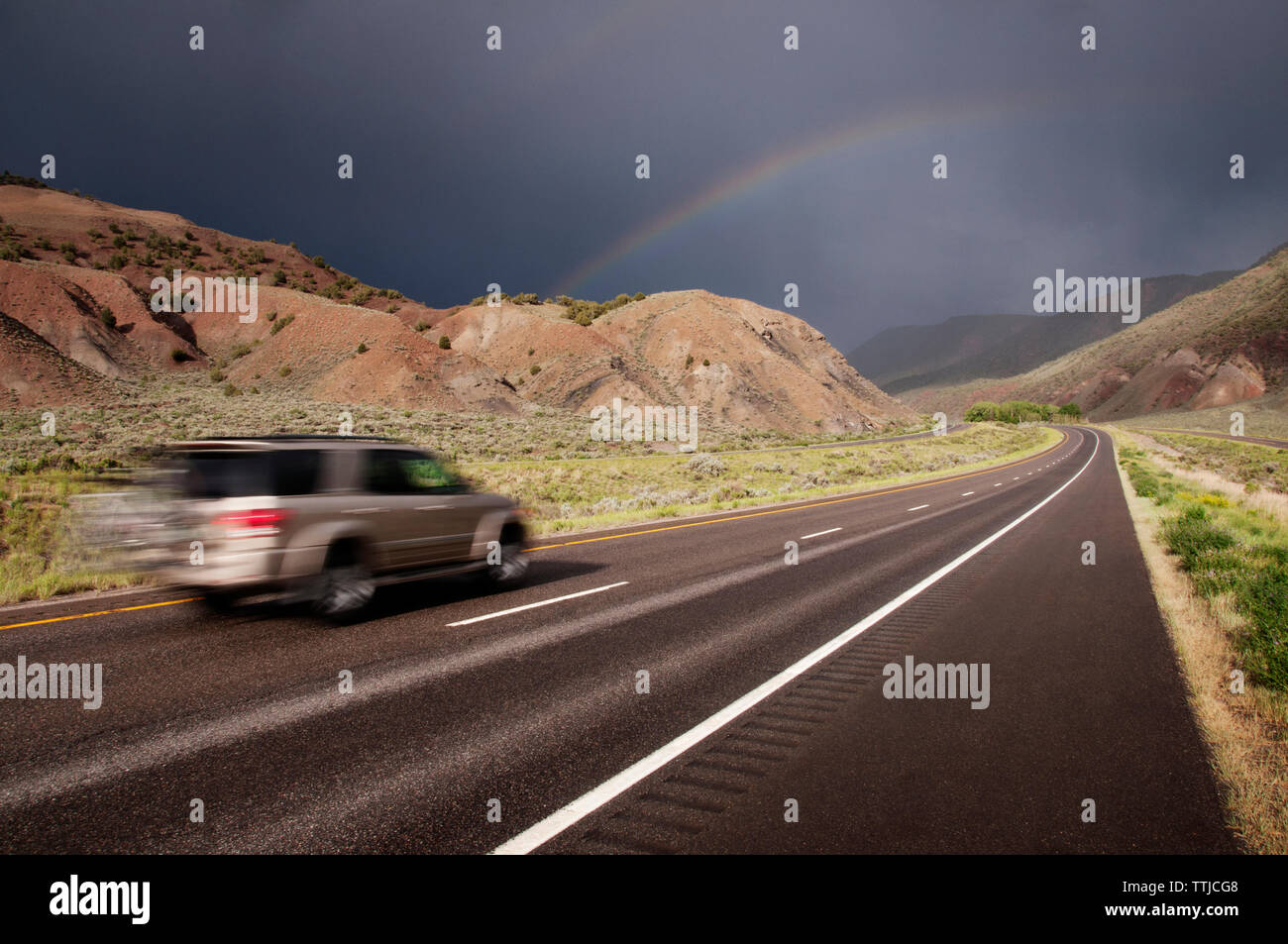 Car moving on road Stock Photo - Alamy