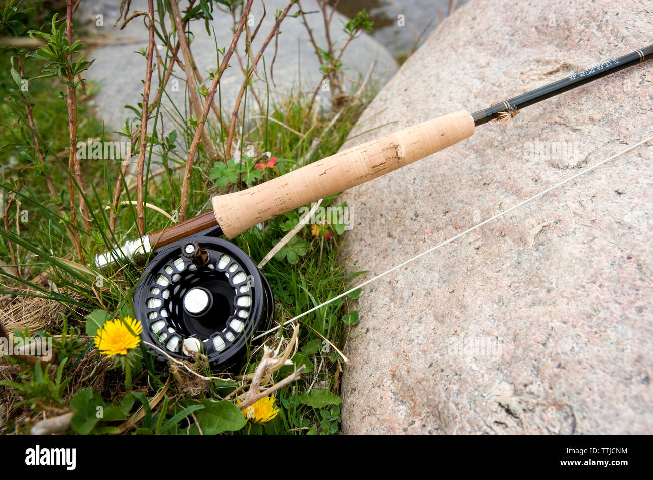 Fishing rod yellow reel hi-res stock photography and images - Alamy