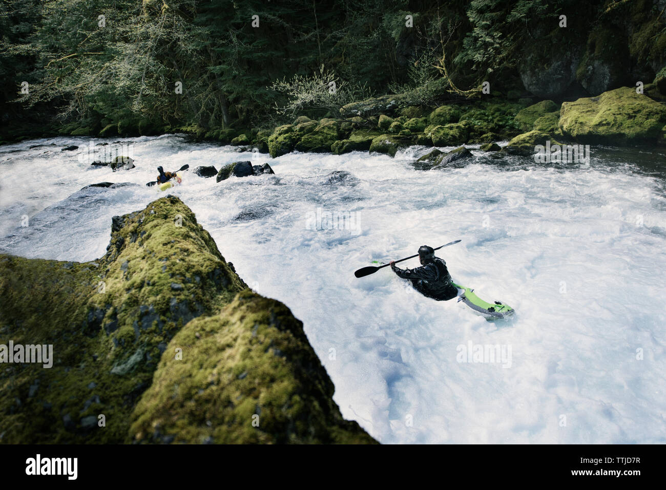 Young people kayaking in river hi-res stock photography and images - Alamy