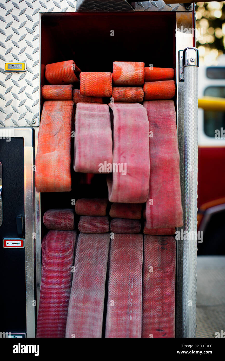 Close-up of water pipes in fire engine Stock Photo - Alamy