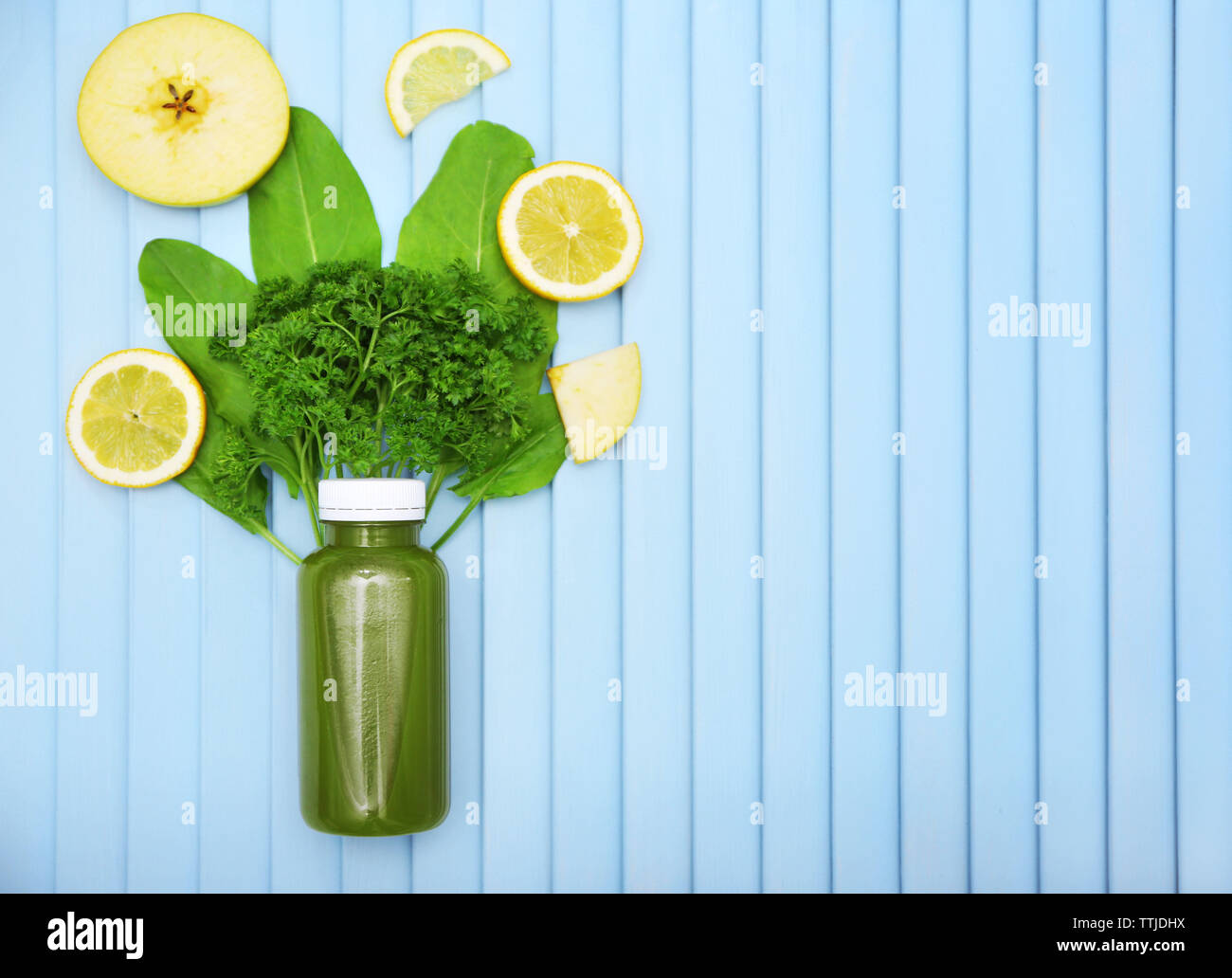 Detox drink on wooden background Stock Photo - Alamy