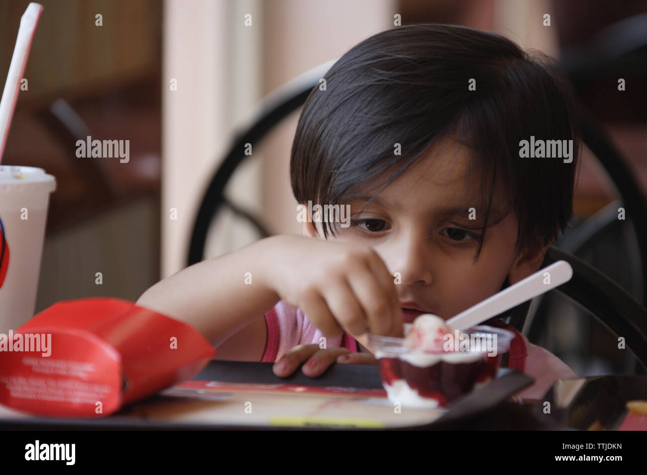 Small child eating soft hi-res stock photography and images - Alamy