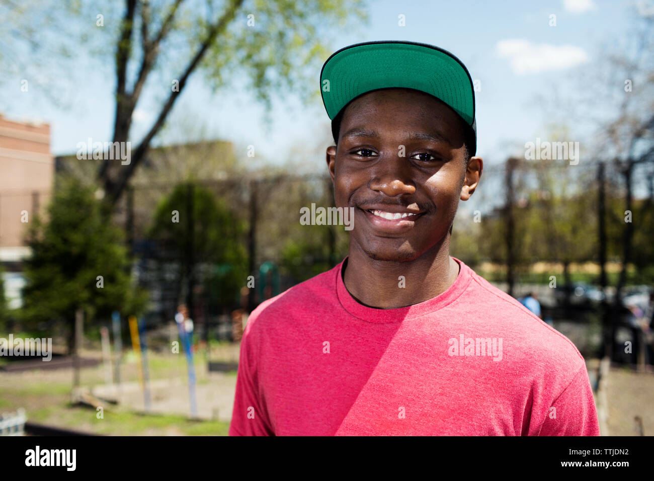Happy man standing outdoors hi-res stock photography and images - Alamy