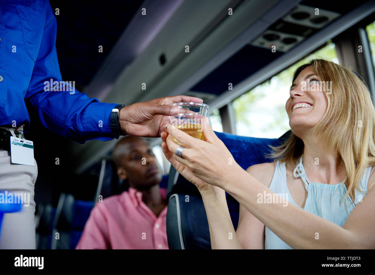 Old woman standing bus hi-res stock photography and images - Alamy