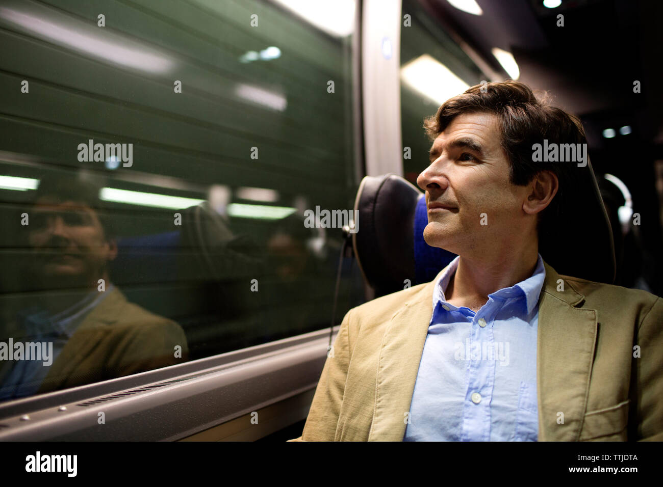 Man looking through bus window day hi-res stock photography and images ...
