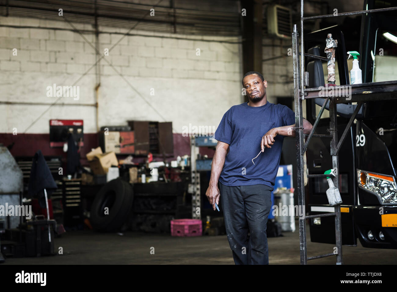 Portrait of workers standing in workshop Stock Photo - Alamy