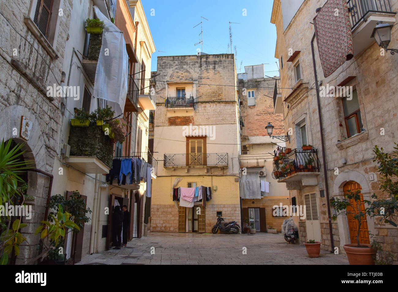 BARI, ITALY - FEBRUARY 9, 2019. Typical picturesque narrow street in ...