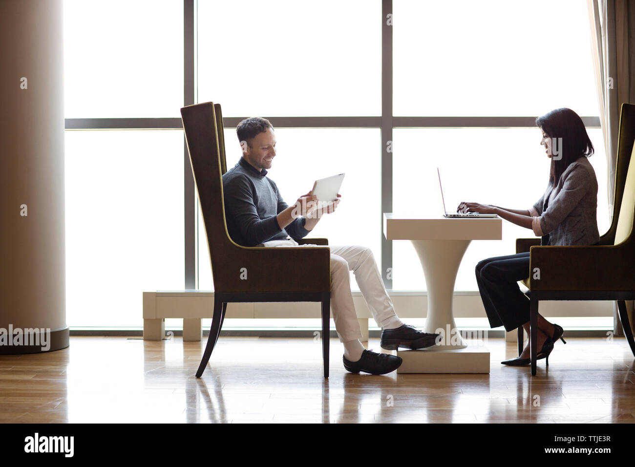 Business people working together brainstorming hi-res stock photography ...