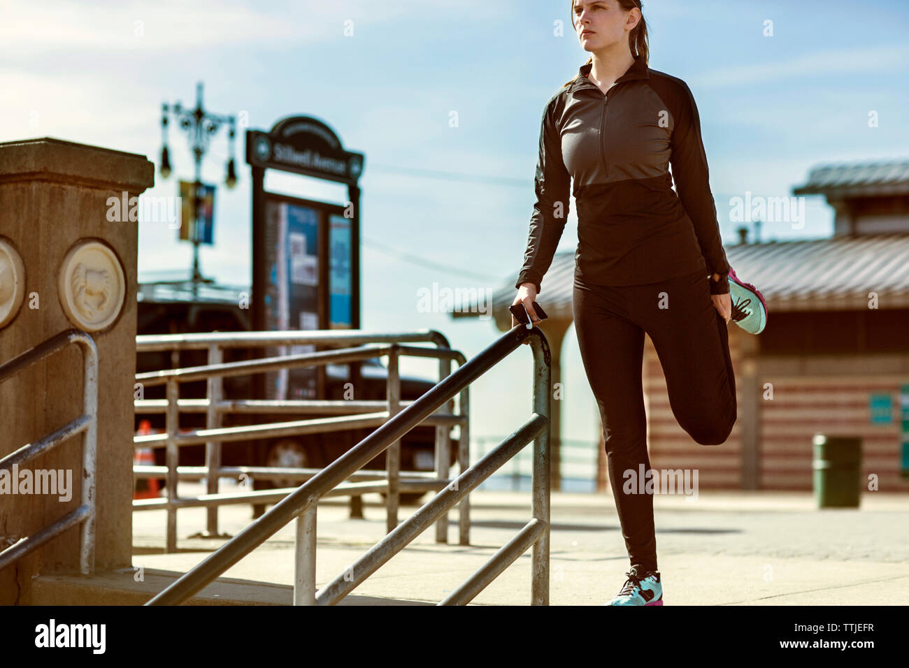 Female swimmer stretching hi-res stock photography and images - Alamy