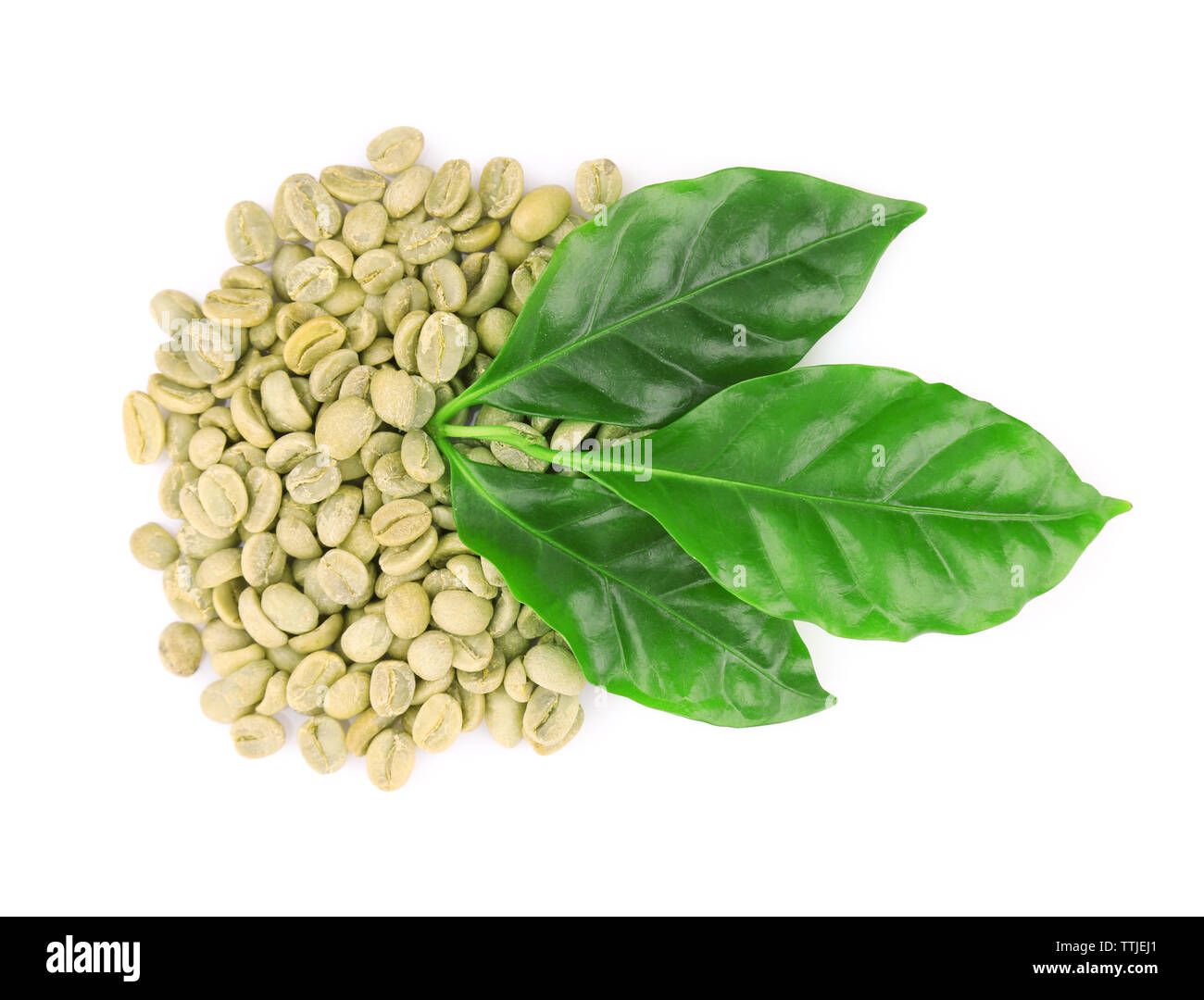 Coffee beans and green leaves, isolated on white Stock Photo - Alamy