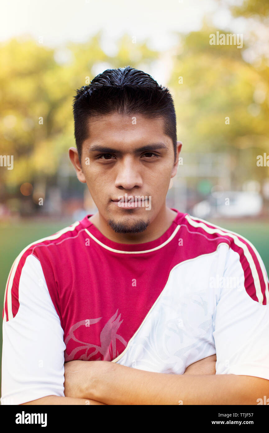 Portrait of player standing at field Stock Photo - Alamy