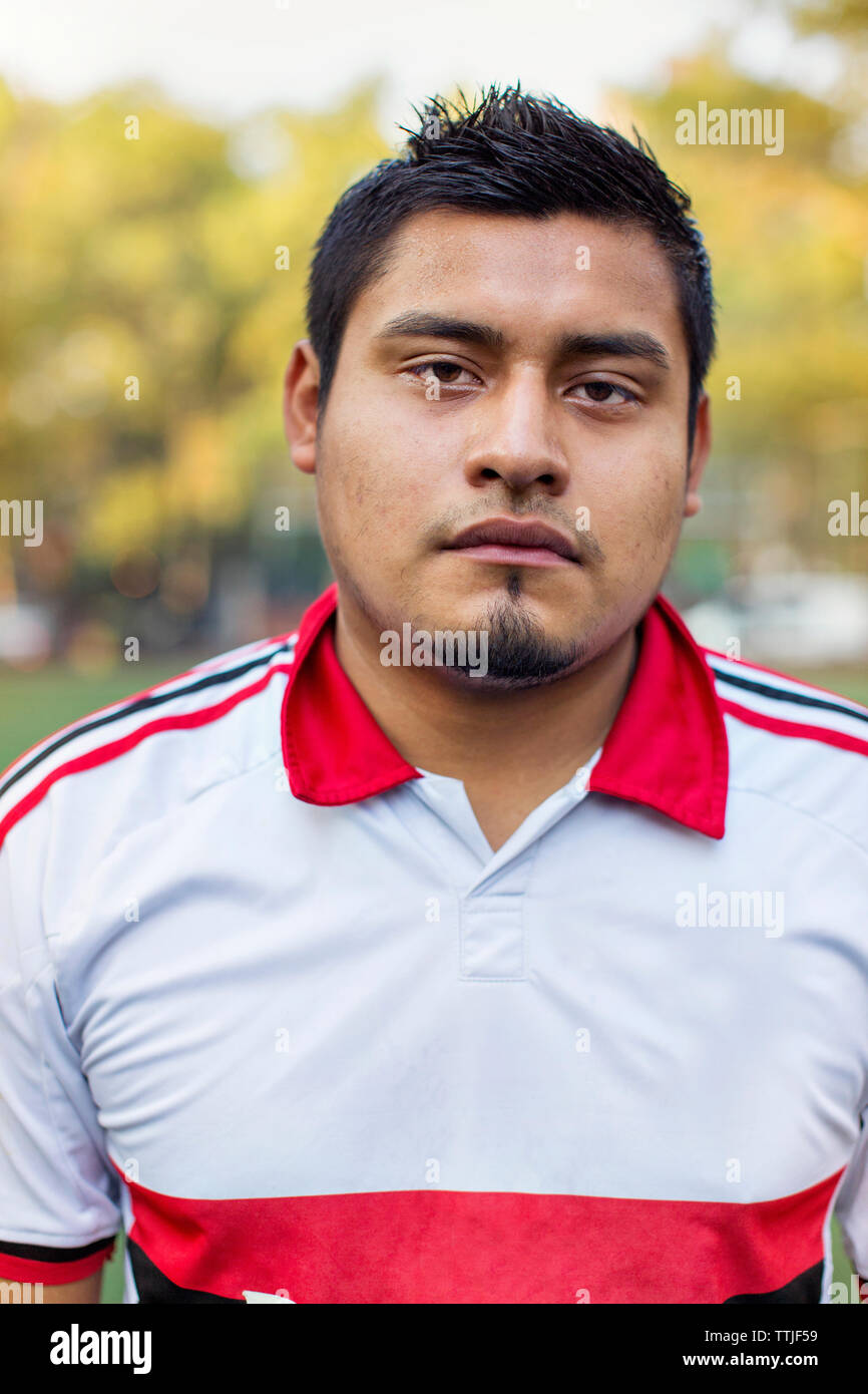 Portrait of sportsman at field Stock Photo - Alamy
