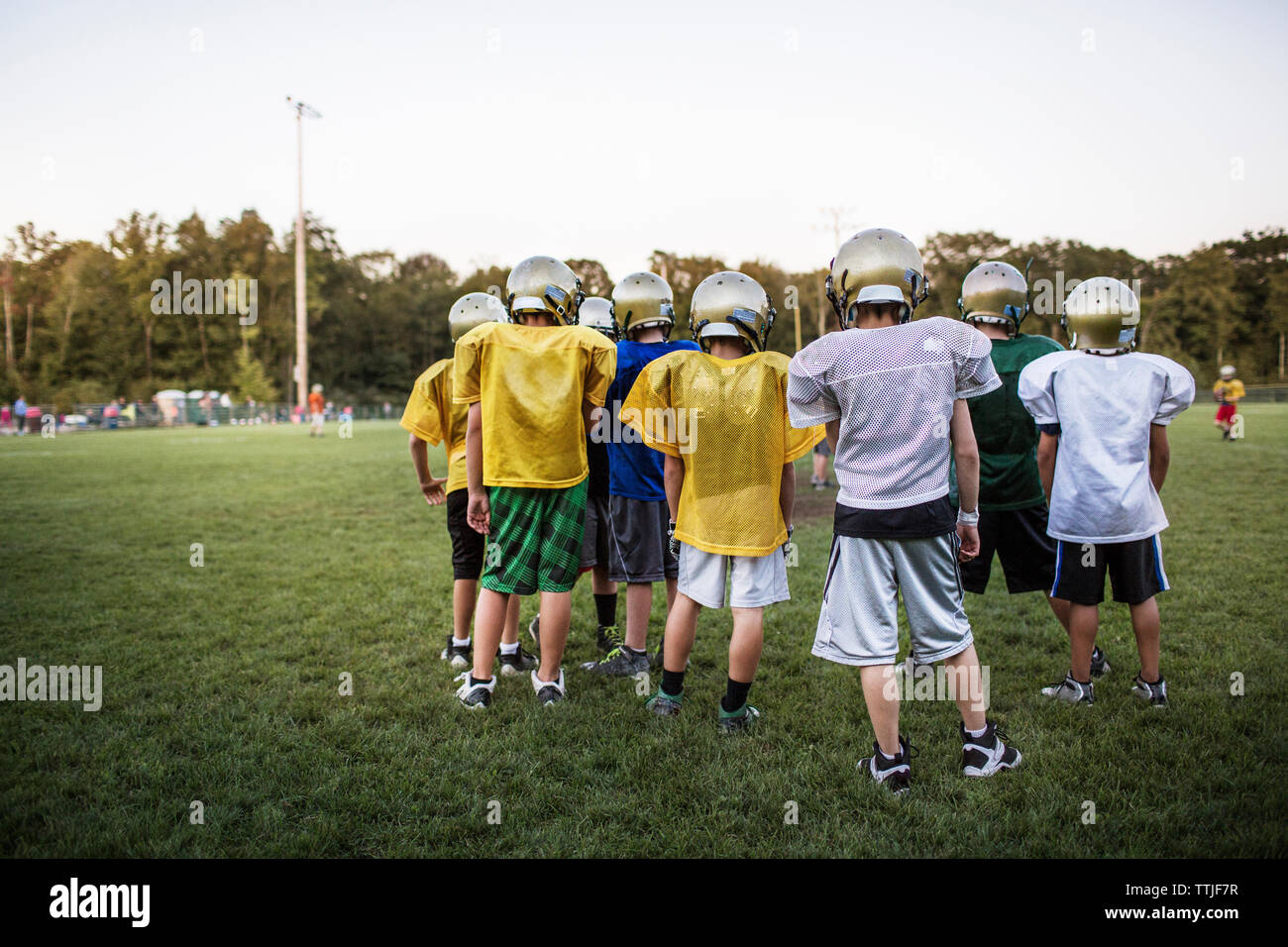Crouching Football Player Standing