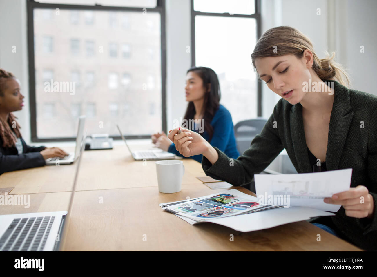 Three work colleagues hi-res stock photography and images - Alamy