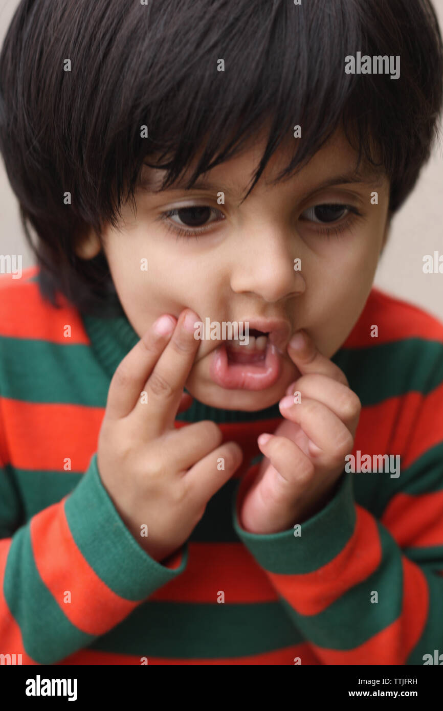 Girl making face Stock Photo - Alamy