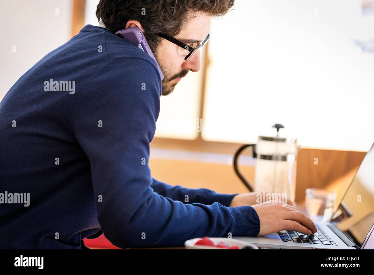 Adult talking laptop home hi-res stock photography and images - Alamy