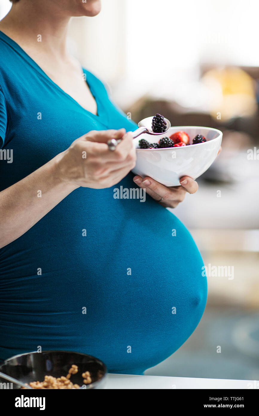 Woman berry eating hi-res stock photography and images - Alamy