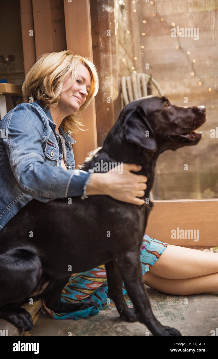 Woman black labrador retriever dog hi-res stock photography and images ...