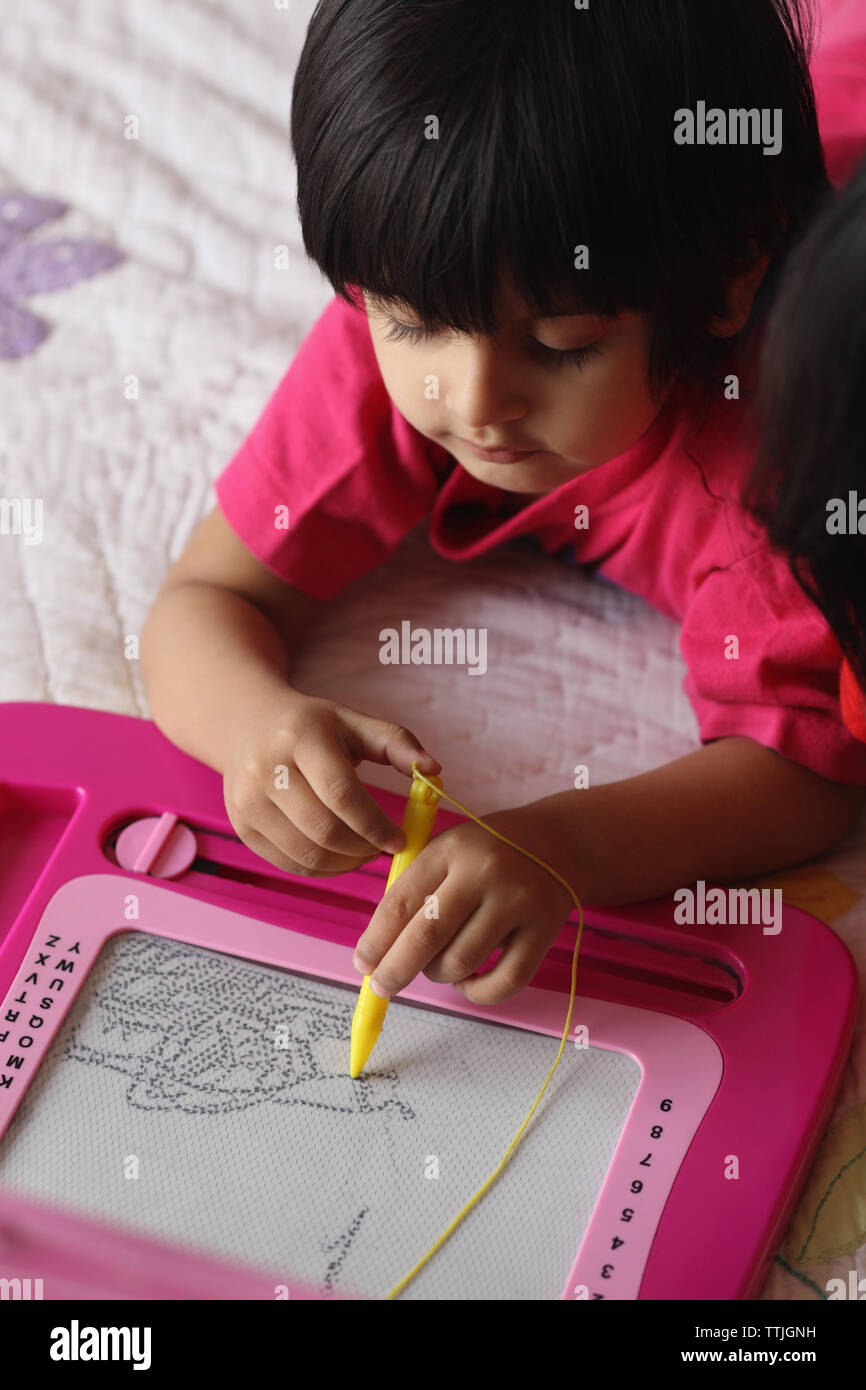 Drawing school girl using hi-res stock photography and images - Alamy