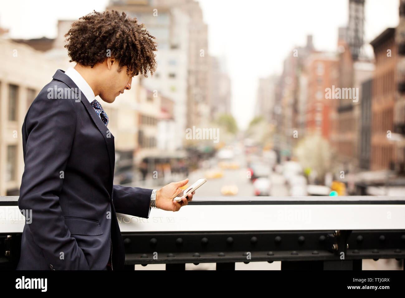 Man standing side view suit hi-res stock photography and images - Alamy