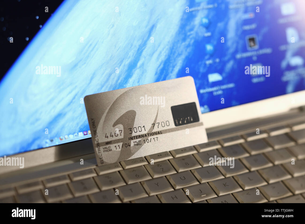 Credit card on a laptop Stock Photo - Alamy
