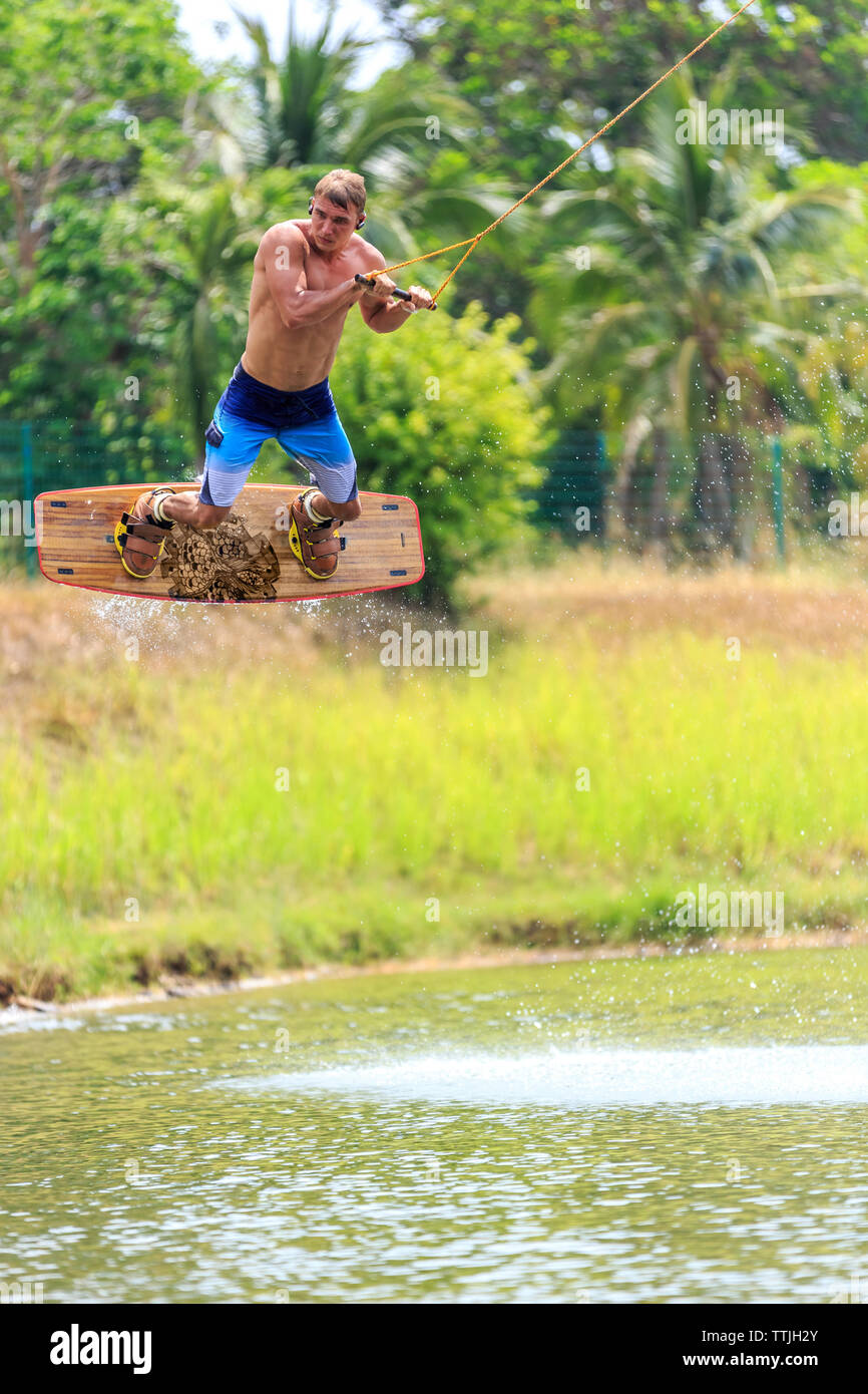 Man Wakeboarding. Jumping. Phuket, Thailand Stock Photo - Alamy