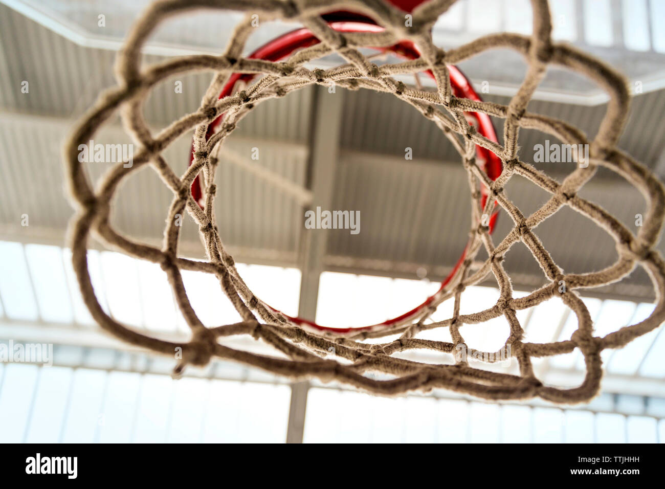 Low angle view of basketball hoop in court Stock Photo - Alamy