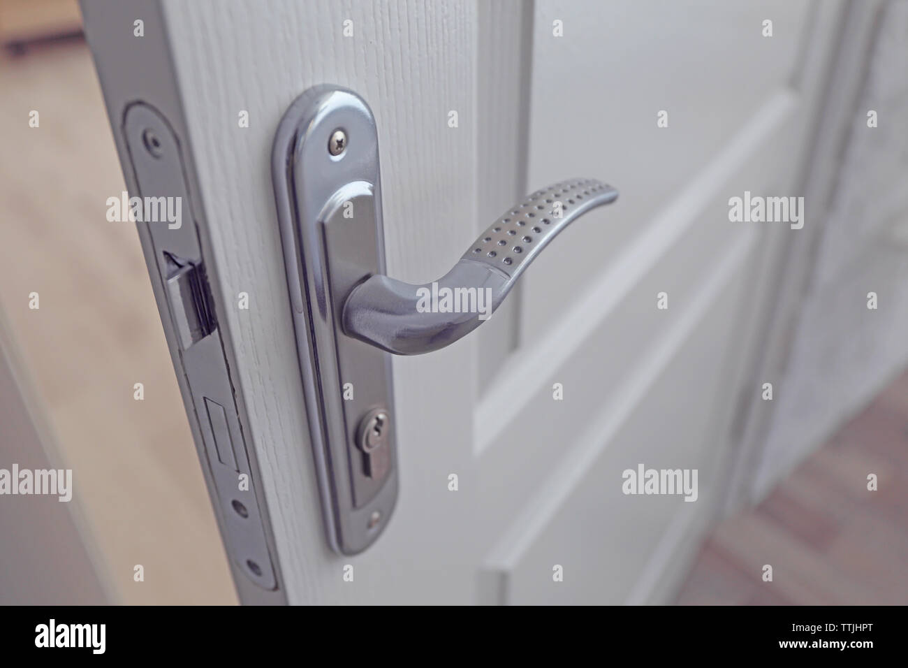 Metal door knob closeup Stock Photo - Alamy