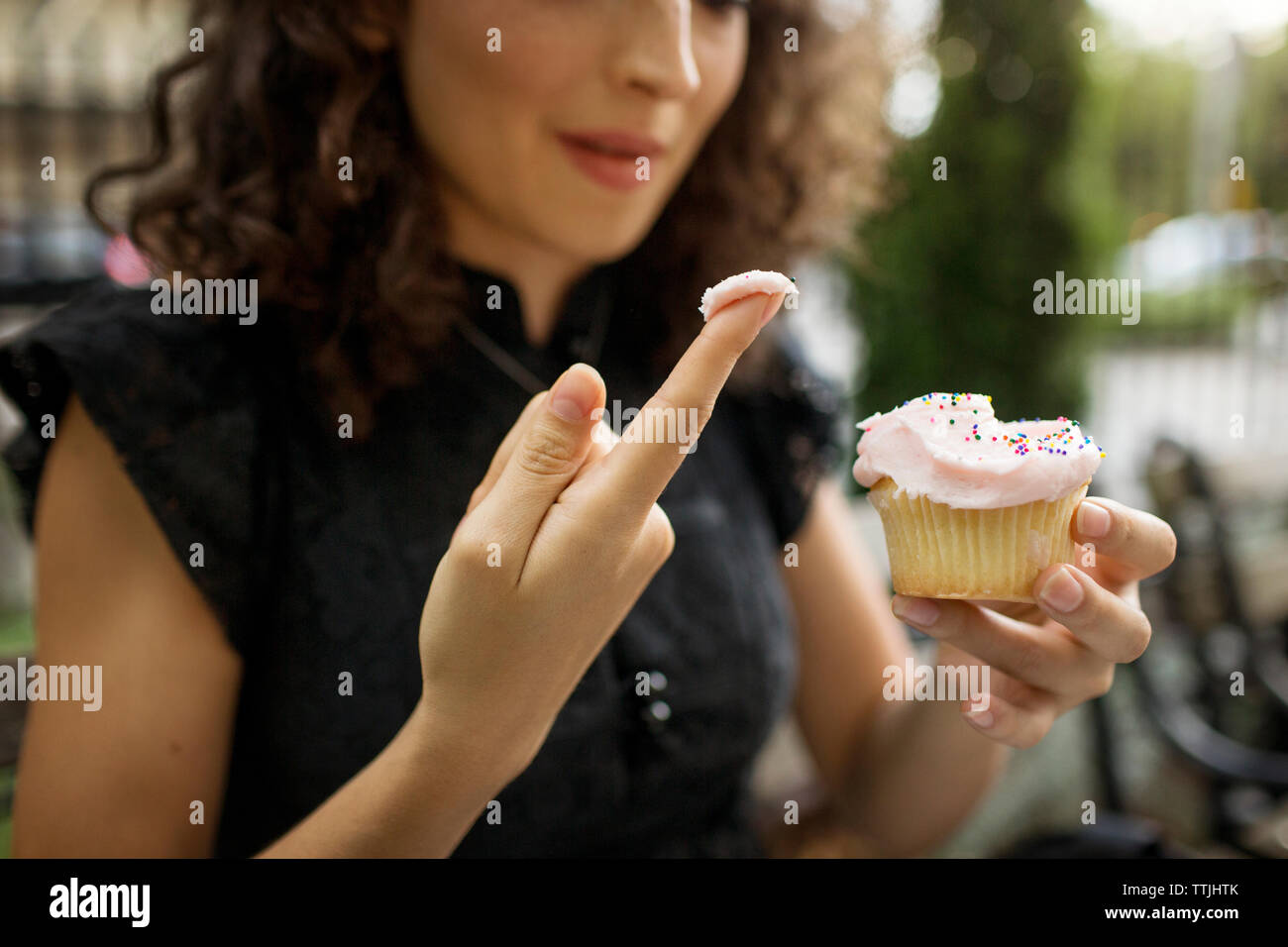Woman eating whipped cream hi-res stock photography and images - Alamy