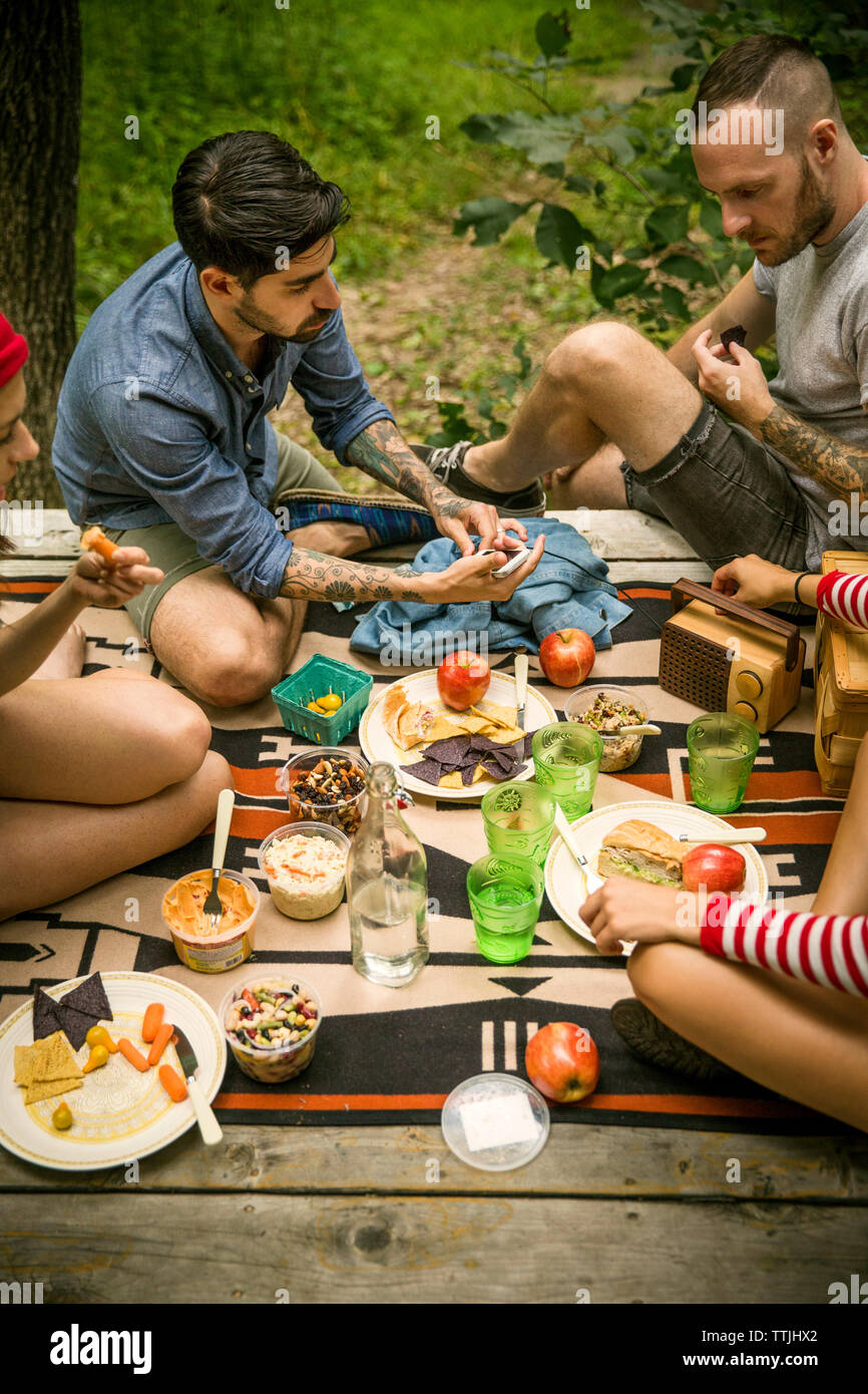 Old man eating sandwich hi-res stock photography and images - Alamy