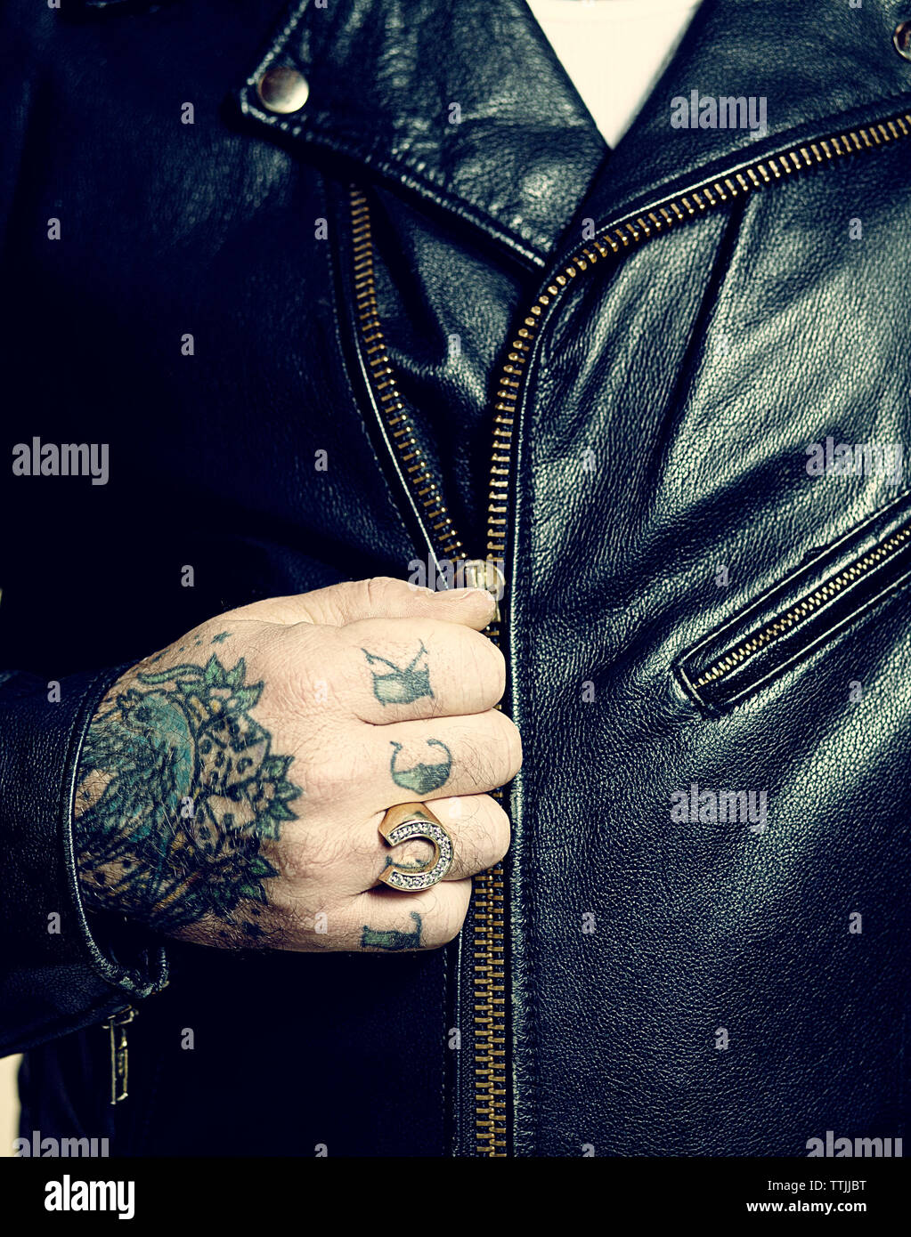 Man zipping jacket hi-res stock photography and images - Alamy